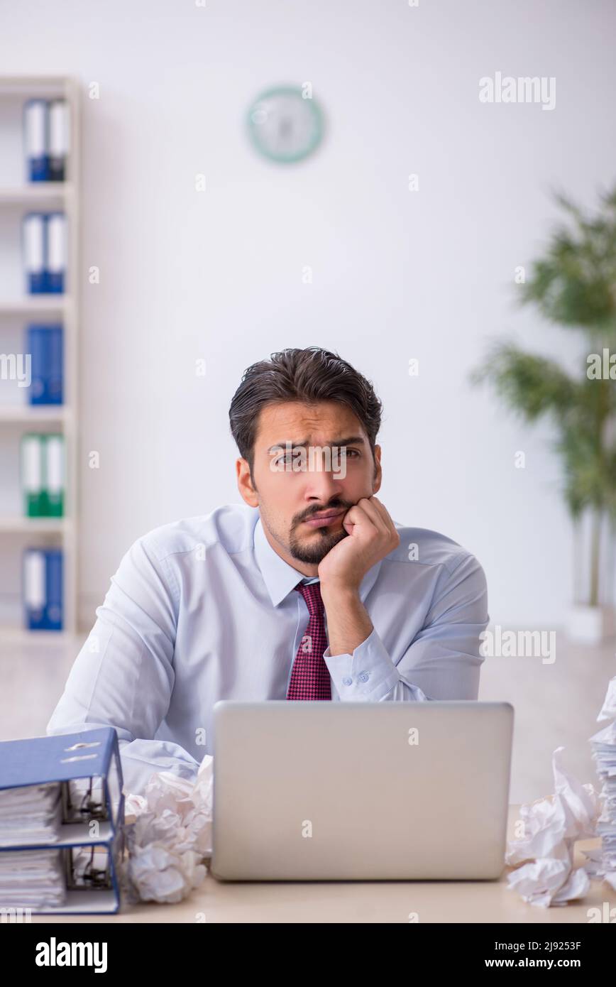 Young businessman employee in rejected ideas concept Stock Photo - Alamy