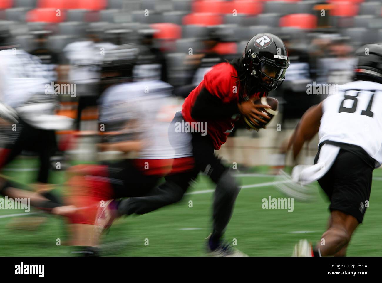 Ottawa Redblacks quarterback Tyrie Adams runs with the ball during the ...