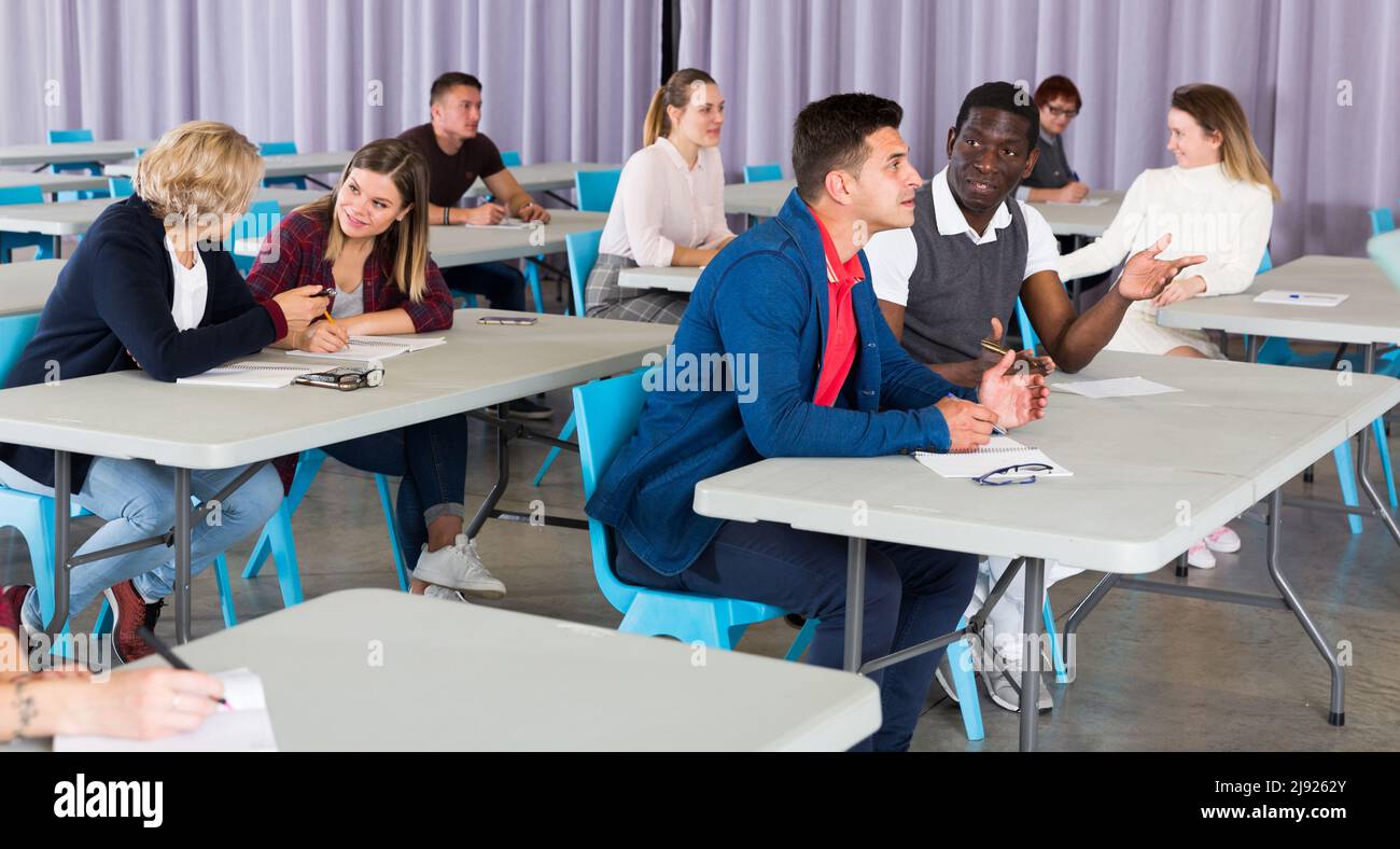 Lecturer discussing hi-res stock photography and images - Alamy