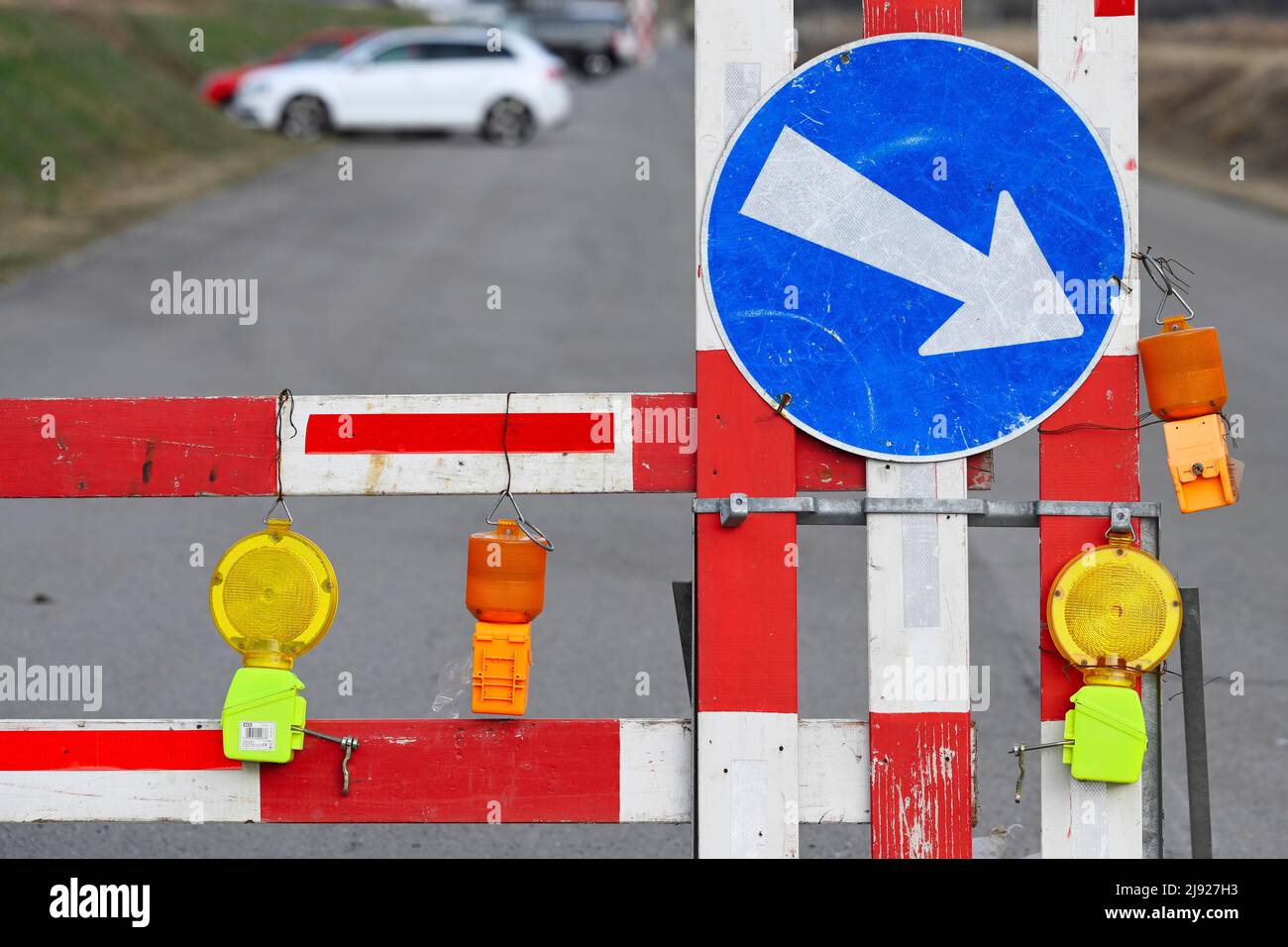 Barrier around construction site on the right Stock Photo - Alamy