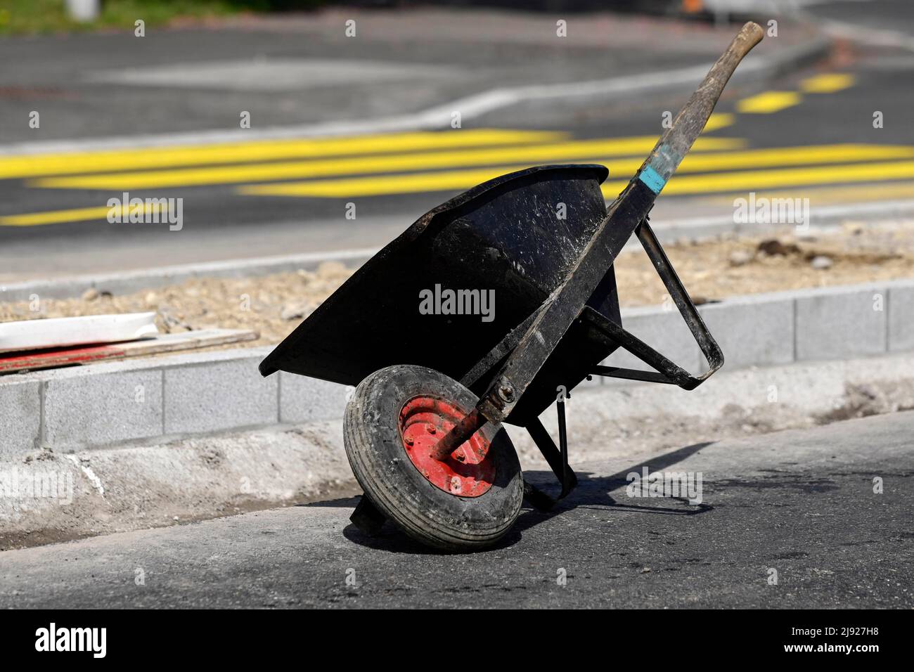 Construction site wheelbarrow Stock Photo - Alamy