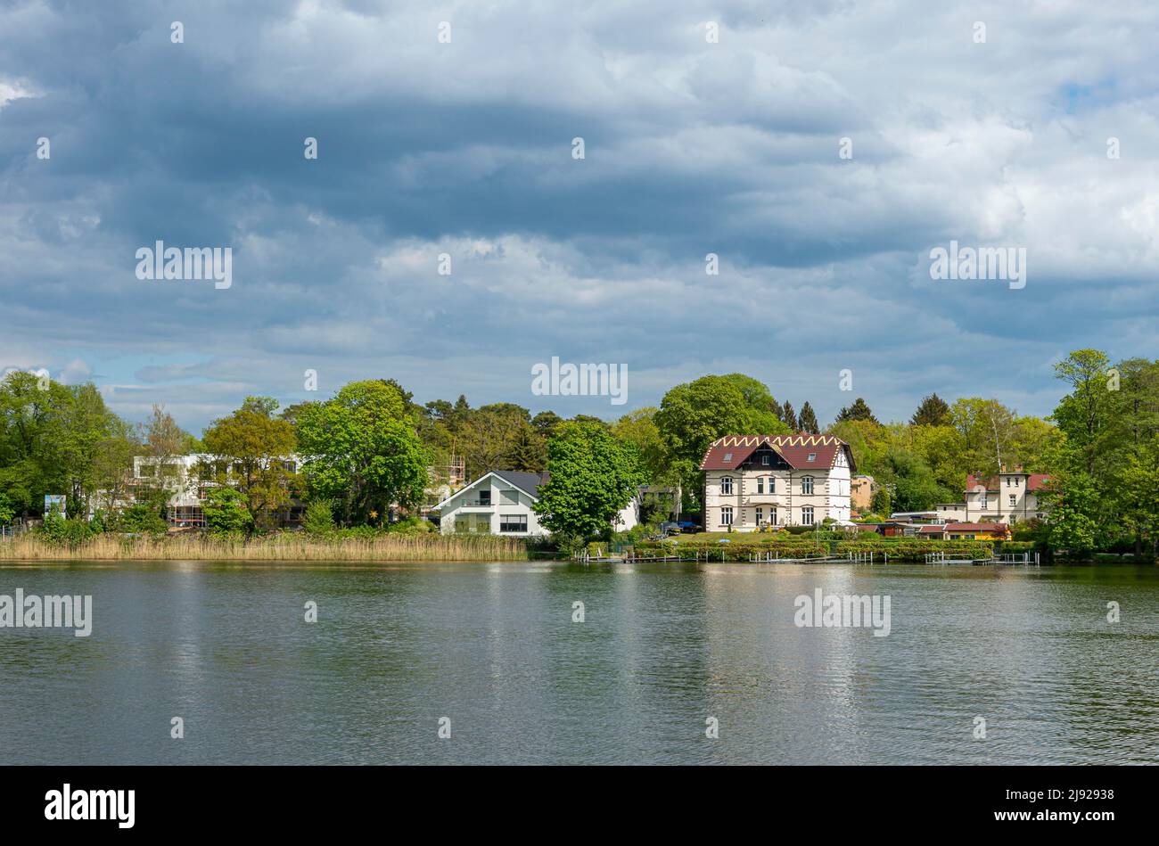 Small boat docks and houses on the Havel between Berlin and Brandenburg ...