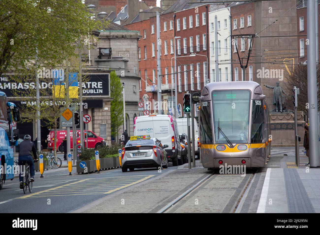 The Luas tram in OConnell Street near the Parnell monumen. Dublin ...