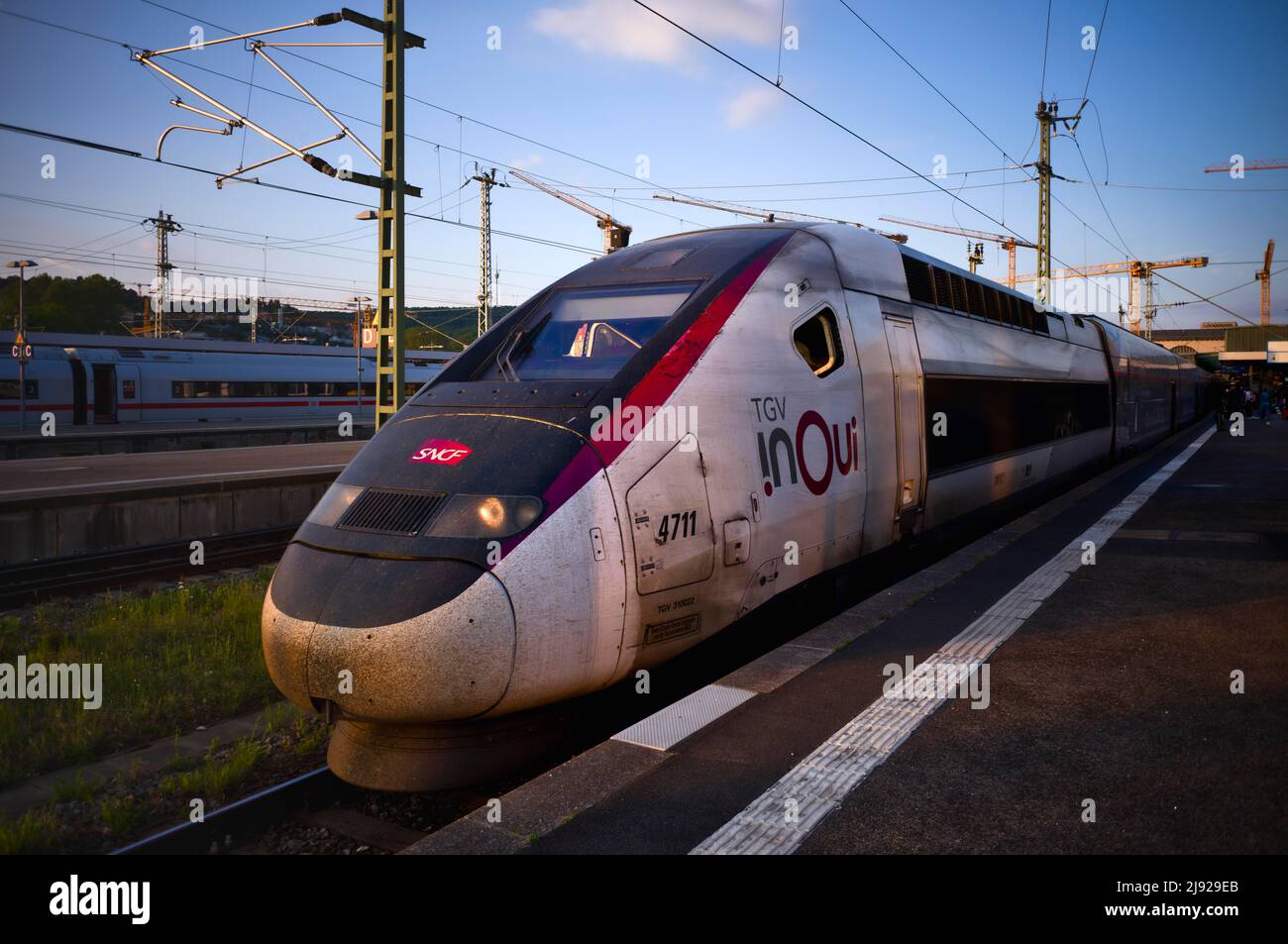 TGV 4711 of SNCF stands on platform, track ready for departure, main ...