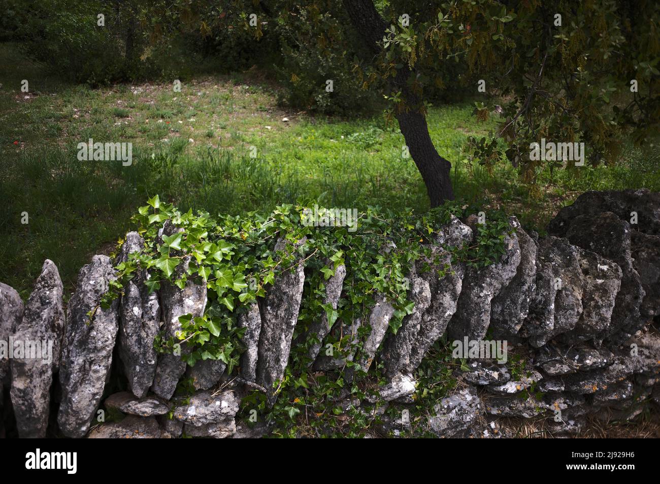 Typical wall of stacked stones, Village des Bories, village of stone ...