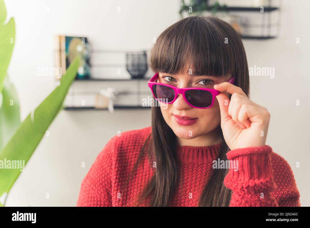 Woman taking off her glasses hi-res stock photography and images - Alamy