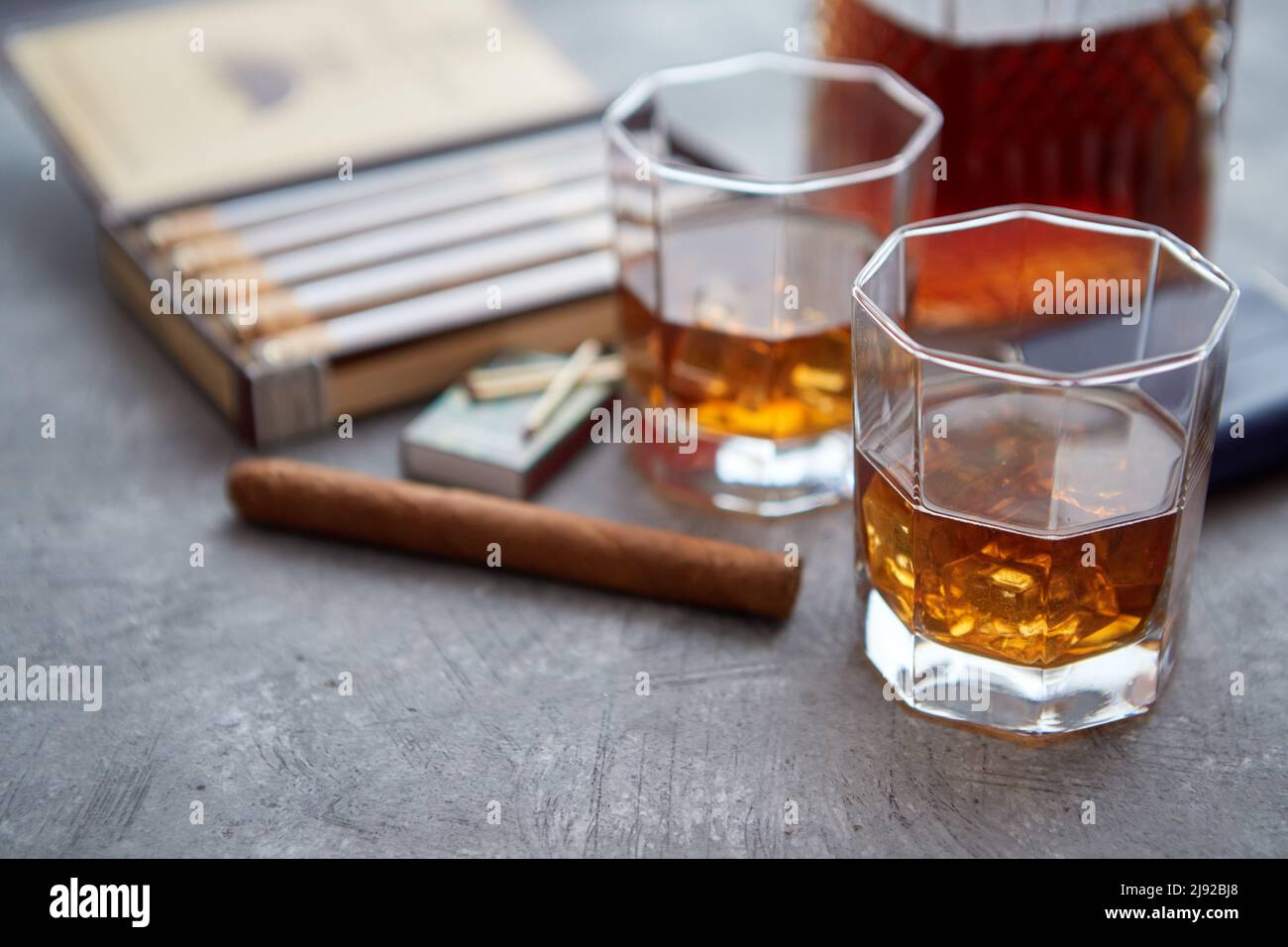 Carafe of Whiskey or brandy, glasses and box of finnest Cuban cigars ...