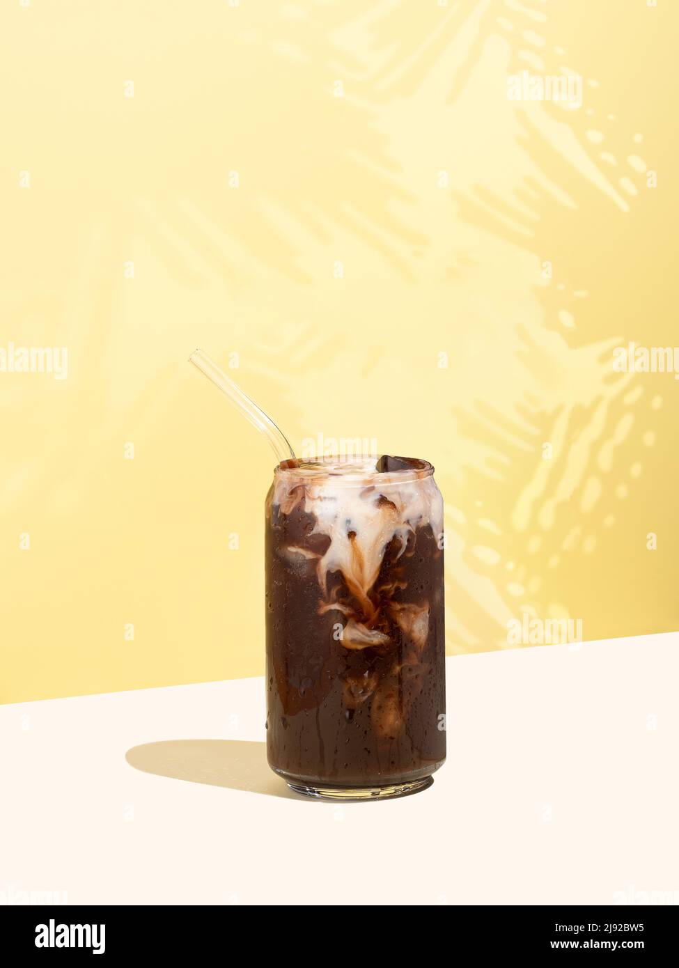 Natural cold cocoa drink with non-dairy milk on a yellow isometric ...