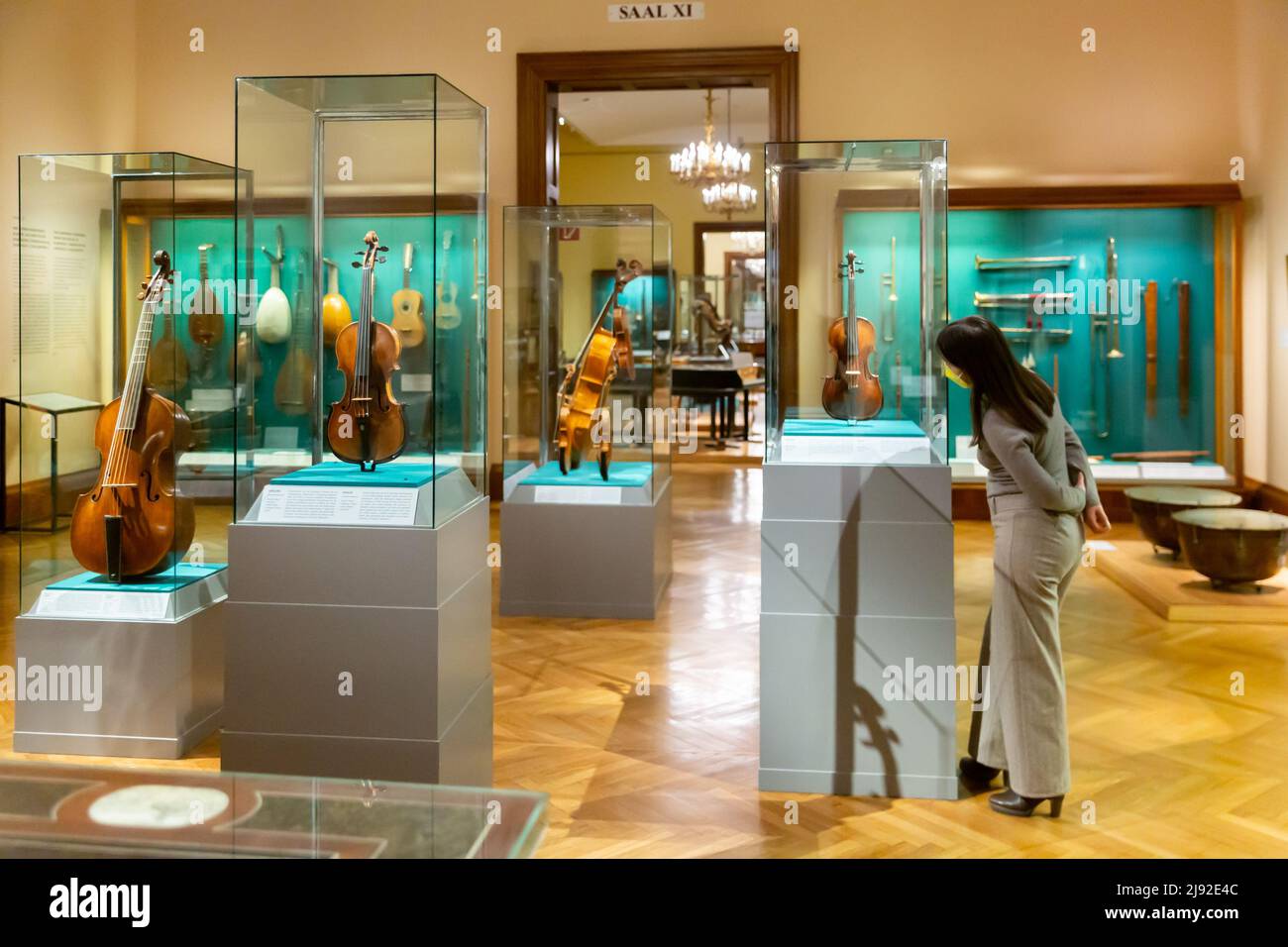 Showcases with bowed string instruments in Weltmuseum Wien, Austria ...