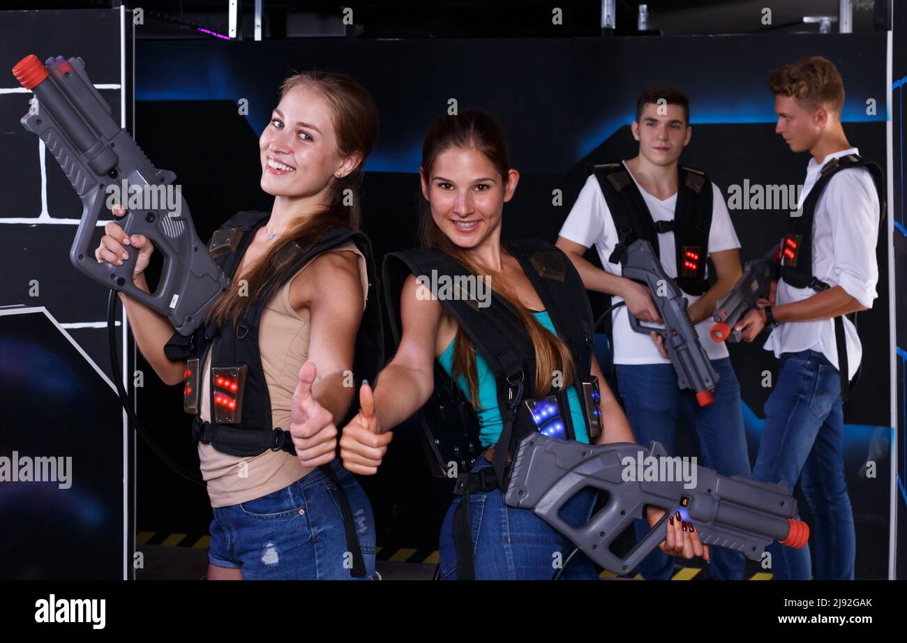 young girls with laser pistols Stock Photo - Alamy