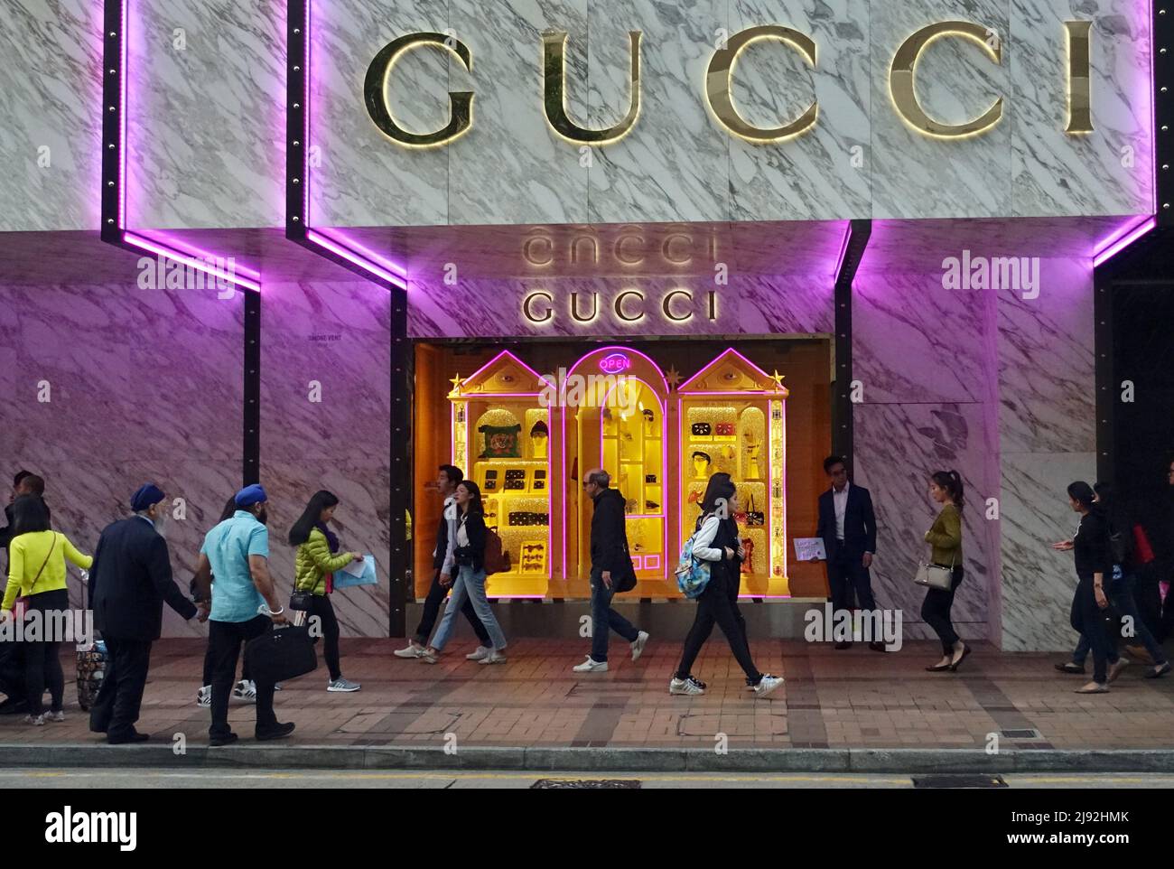 06.12.2017, Hong Kong, Hong Kong, China - People walk past a branch of ...