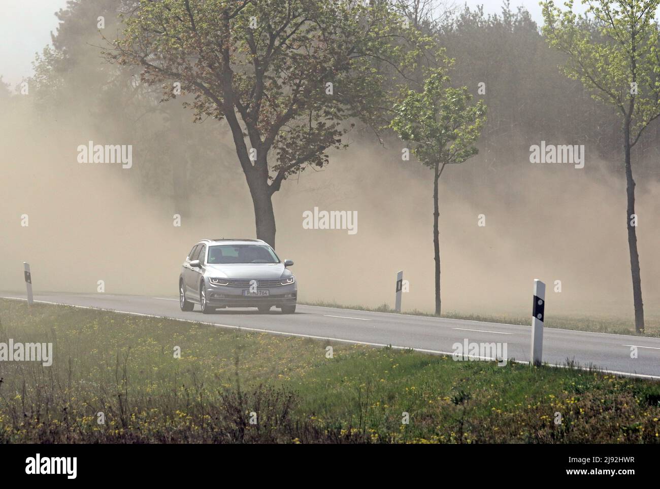 Dust cloud created by car hi-res stock photography and images - Alamy
