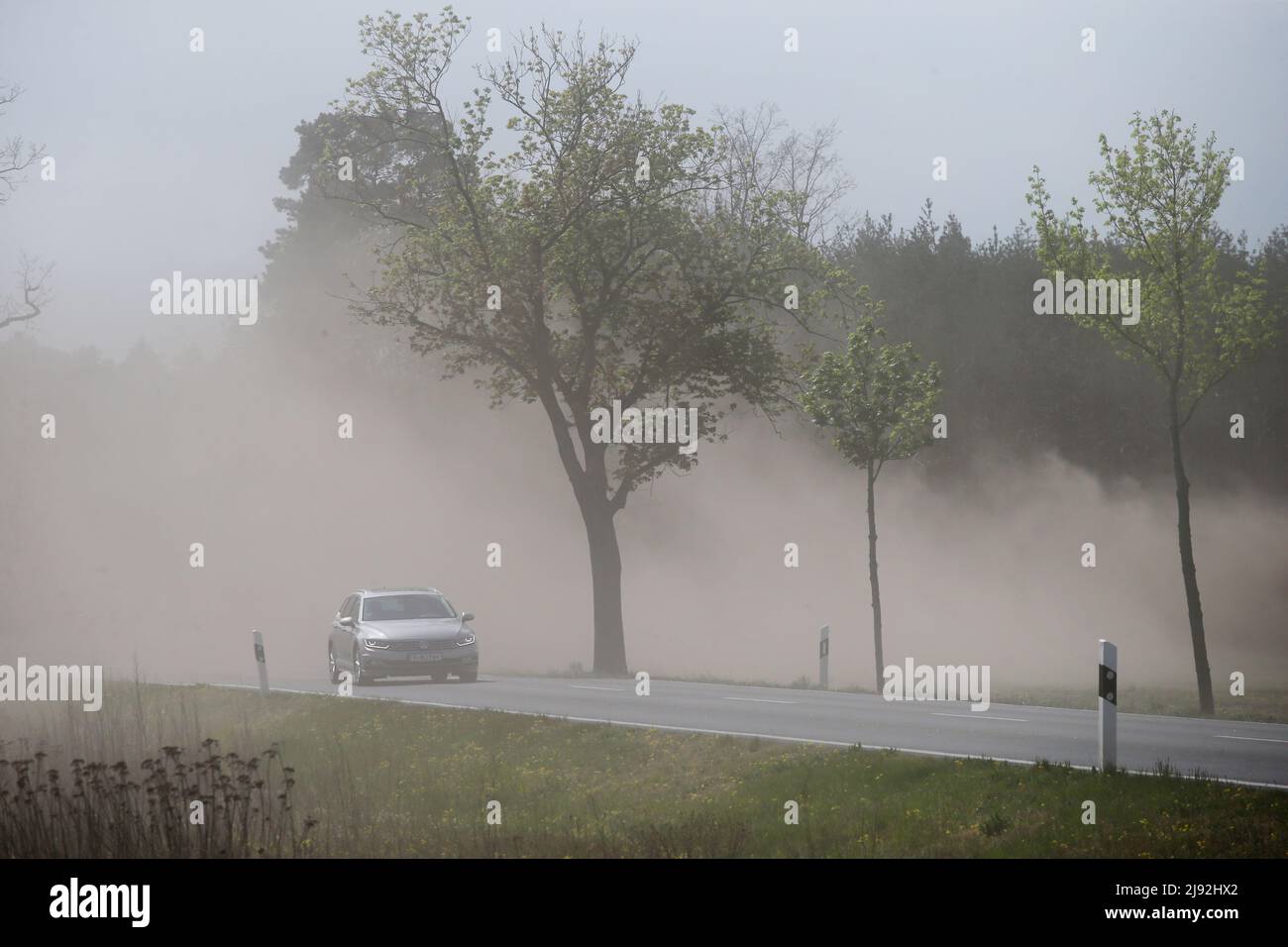 Dust cloud created by car hi-res stock photography and images - Alamy