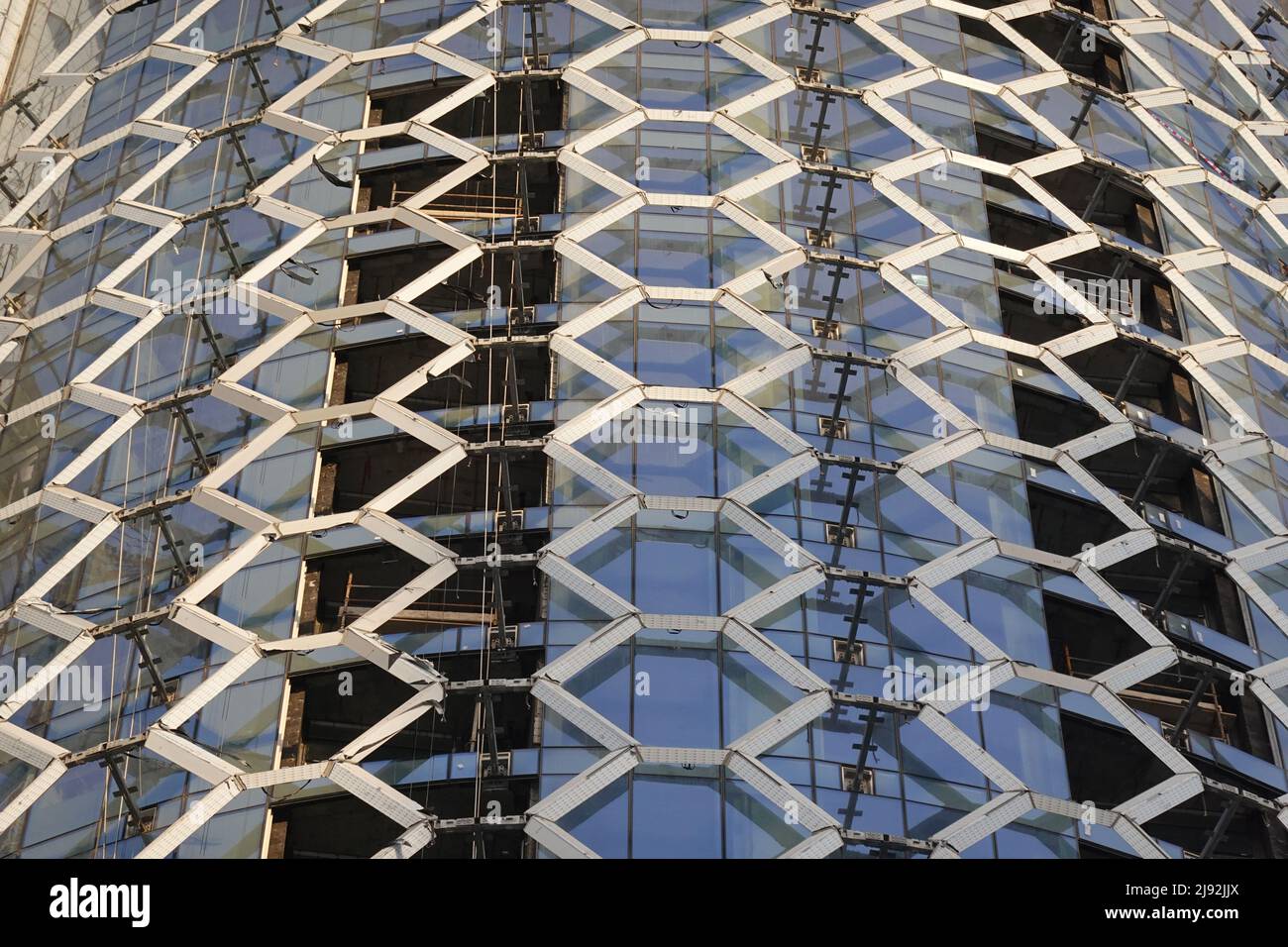 22.02.2022, Doha, , Qatar - Hexagonal facade cladding on a new building ...
