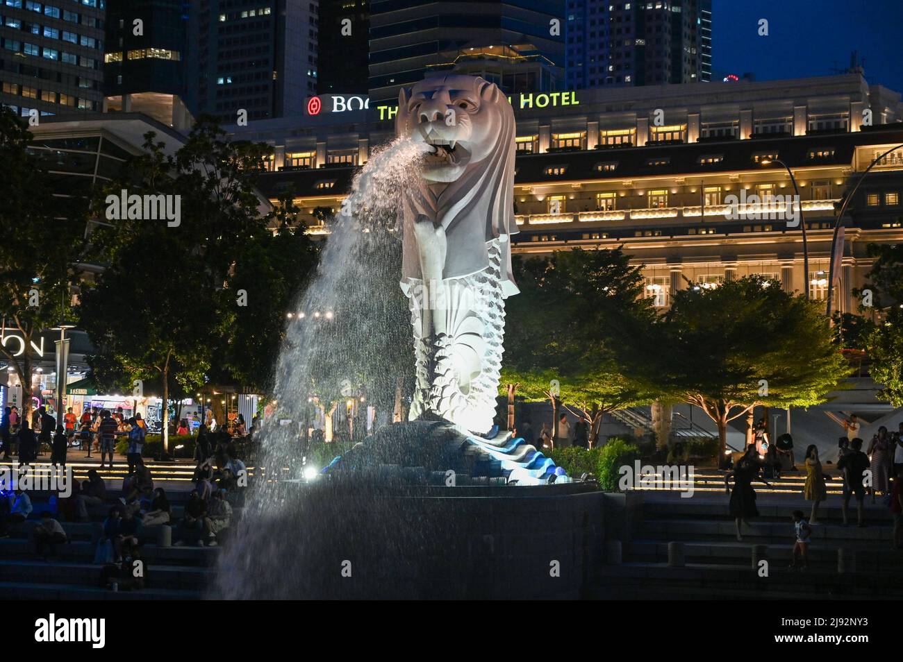 Merlion Park, a iconic statue in Singapore at Night. Merlion is a ...