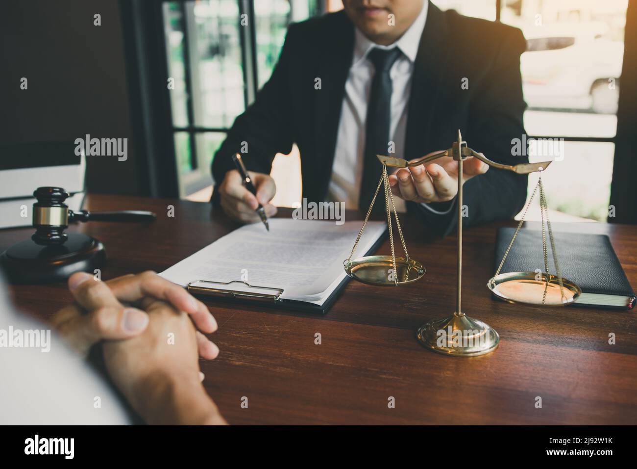 Lawyer is explaining about the wrongdoing laws regarding fraud to the ...