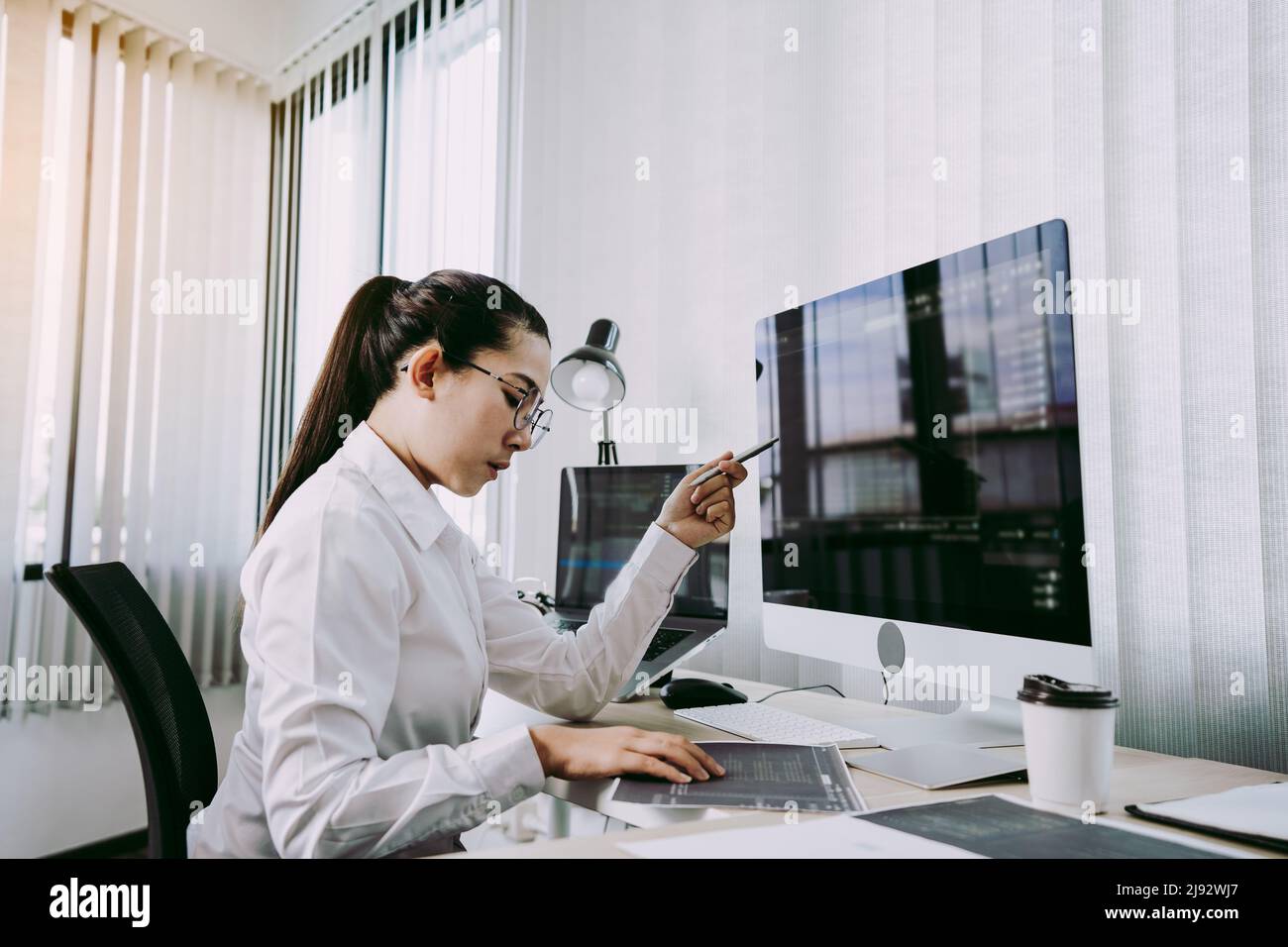 Asian woman professional development programming website working a ...