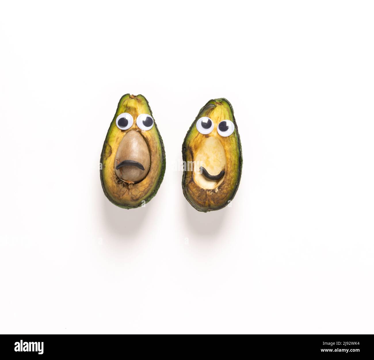 Spoiled rotten fruit vegetables cheerful avocado with eyes white ...