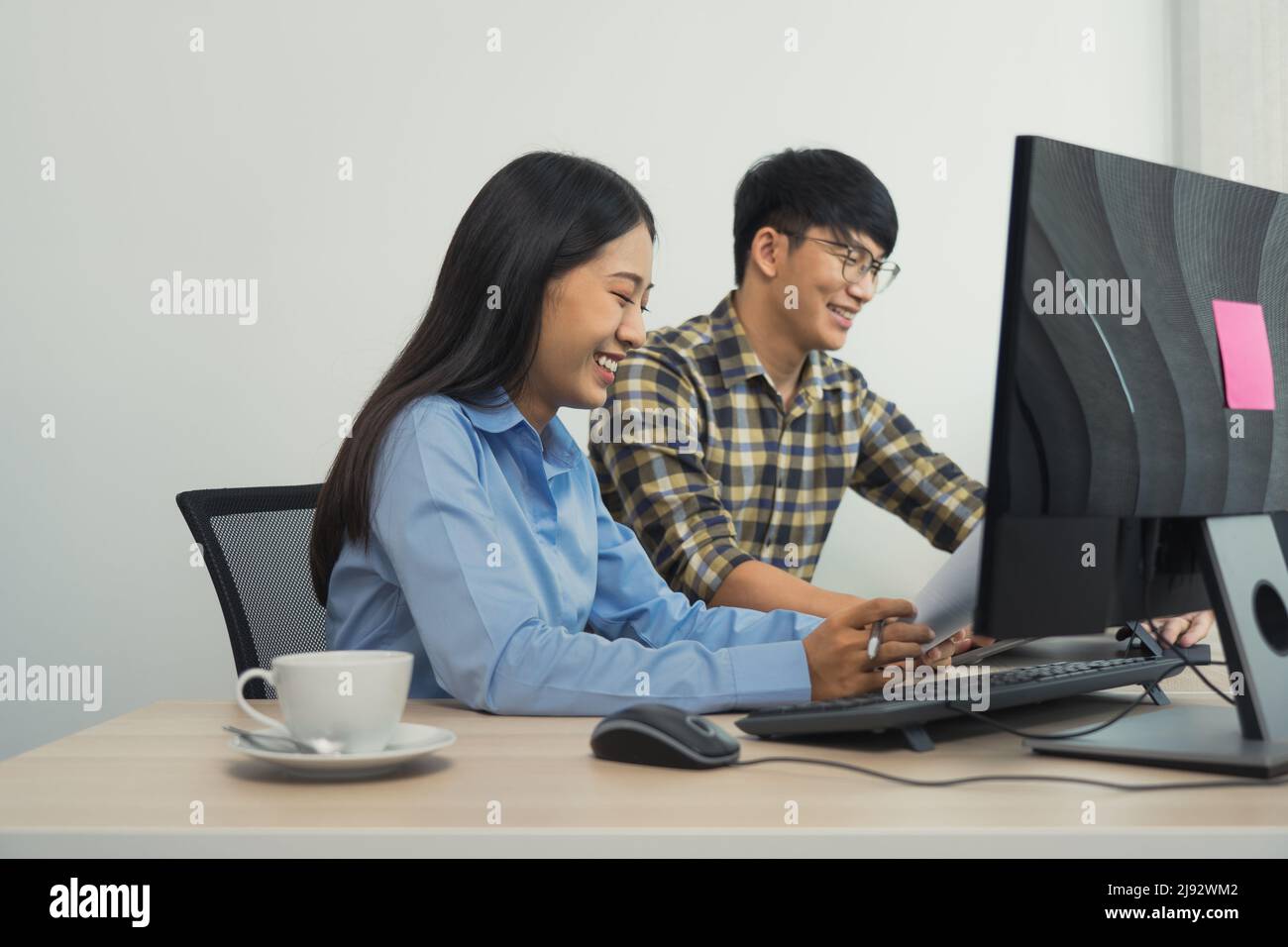 Programmers working computer codes in hi-res stock photography and ...