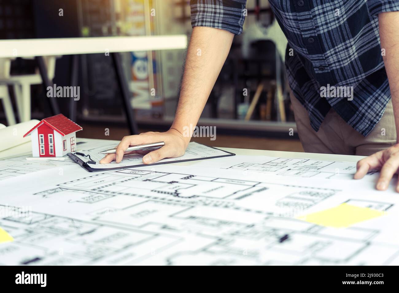 Engineers are designing working on blueprints and analyzing the ...