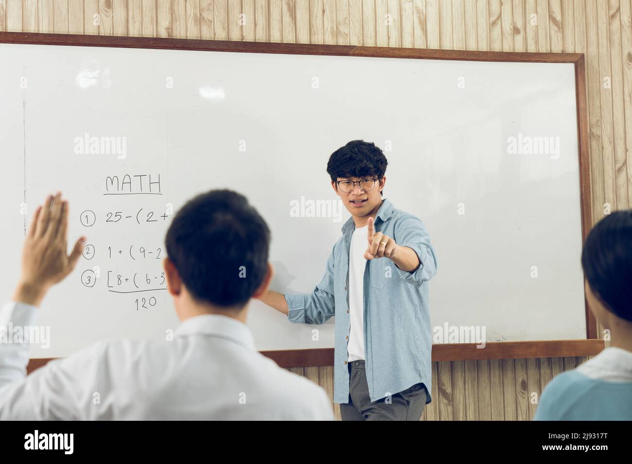 Asian male teacher math class hi-res stock photography and images - Alamy