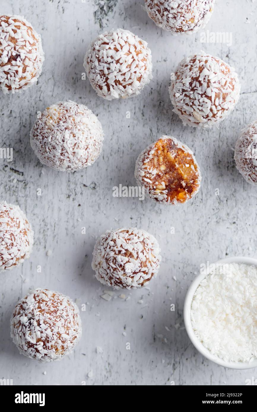Homemade dates candies with coconut top view Stock Photo - Alamy