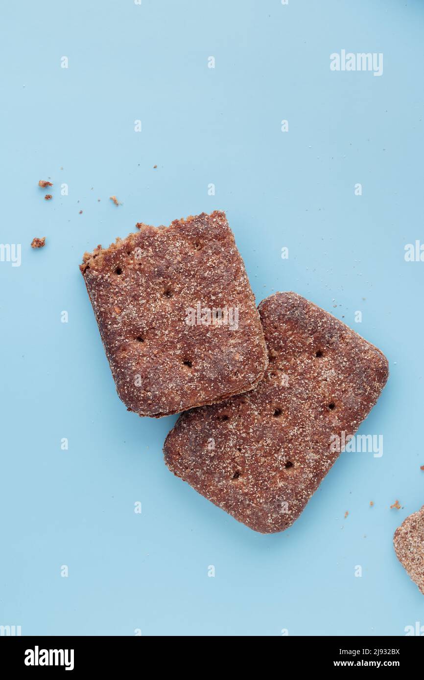 Finnish Rye Bread pattern on a blue background vertical Stock Photo - Alamy