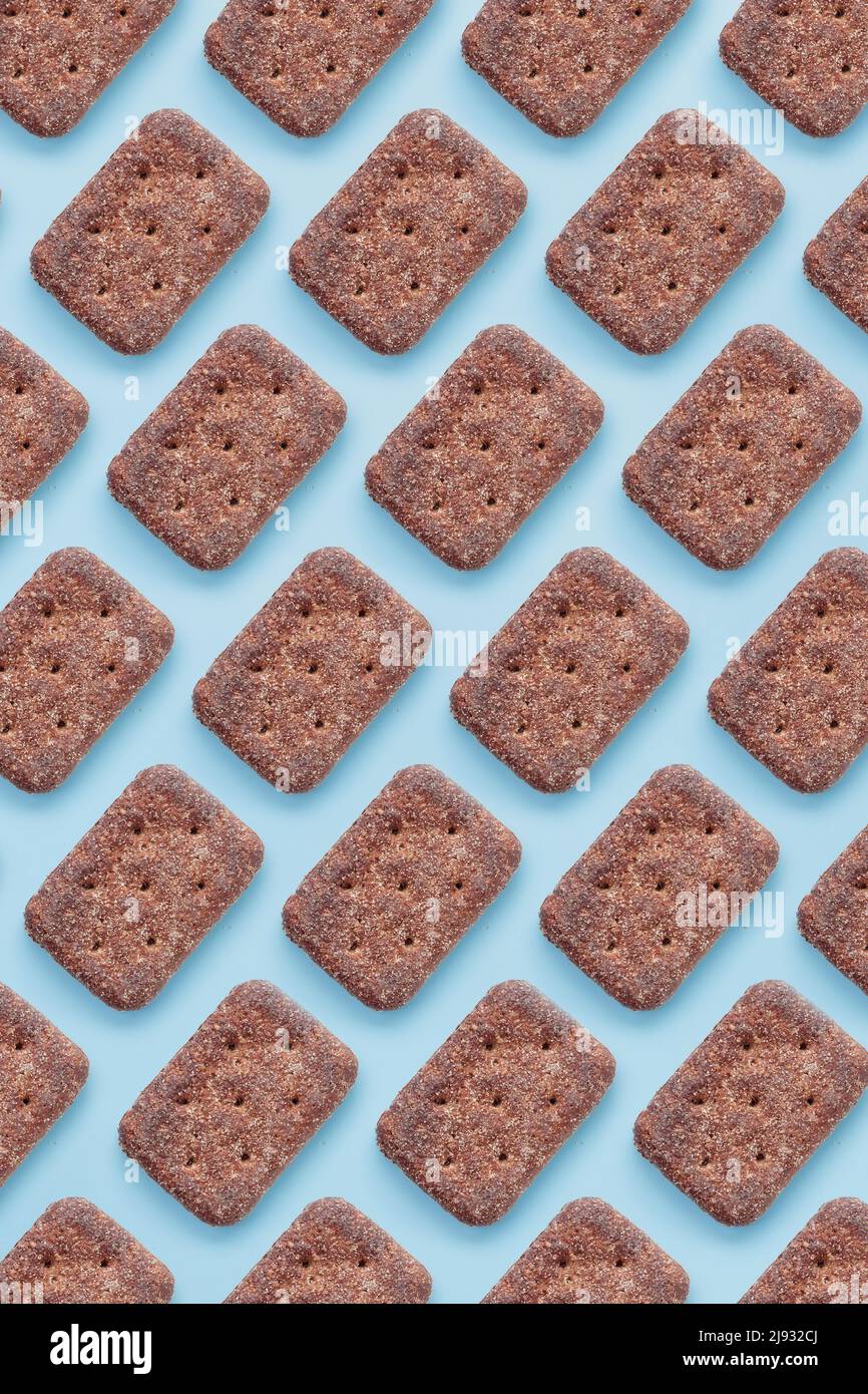 Finnish Rye Bread pattern on a blue background vertical Stock Photo - Alamy