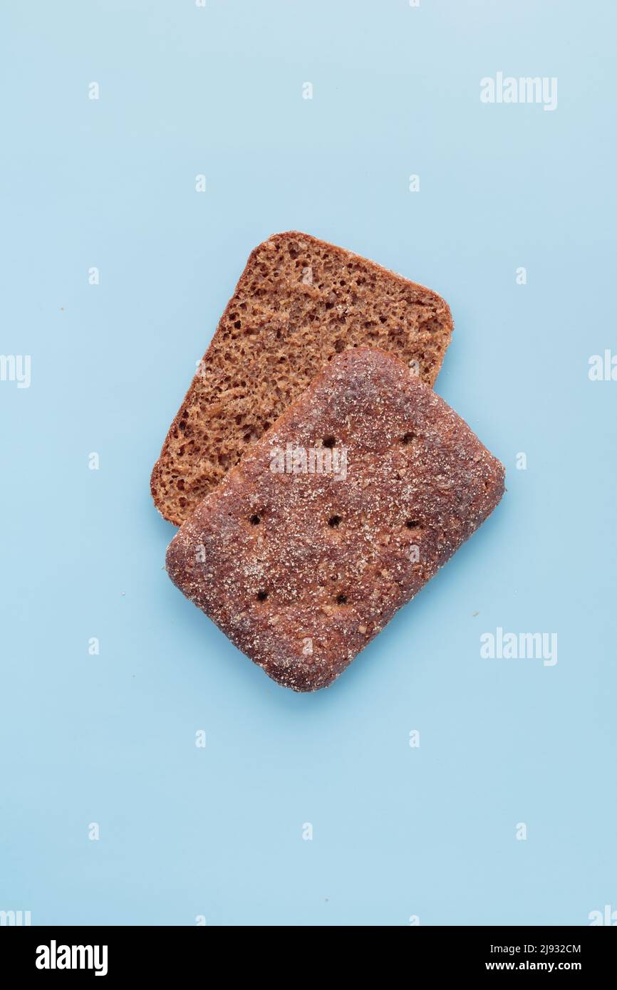 Finnish Rye Bread pattern on a blue background vertical Stock Photo - Alamy