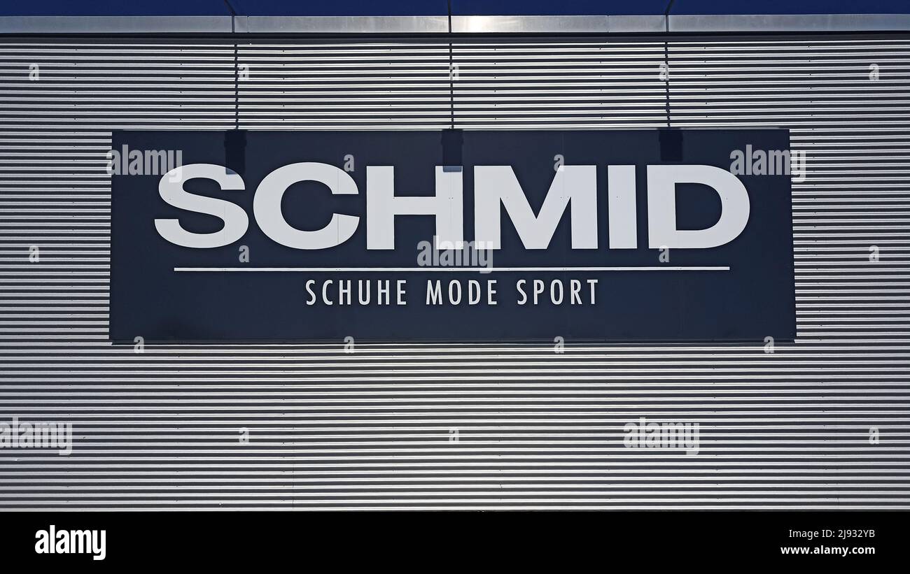 Logo of the fashion and sportswear store Schmidt on the background of a ...