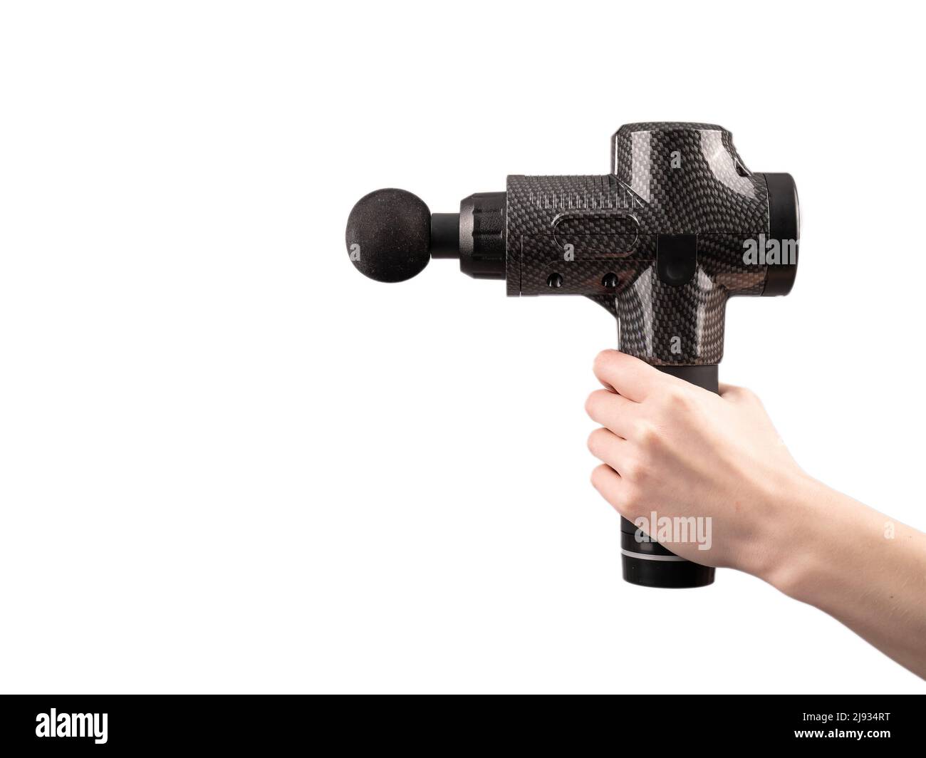 Close-up of a female hand with a portable massager gun on a white ...