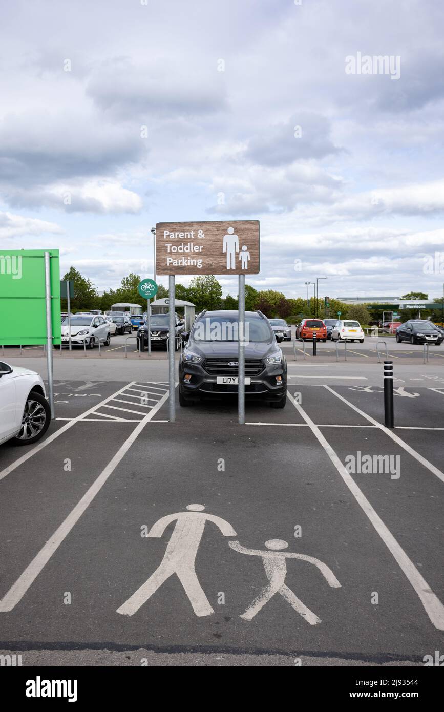 Parent and toddler parking sign at Morrisons supermarket Starbeck store ...