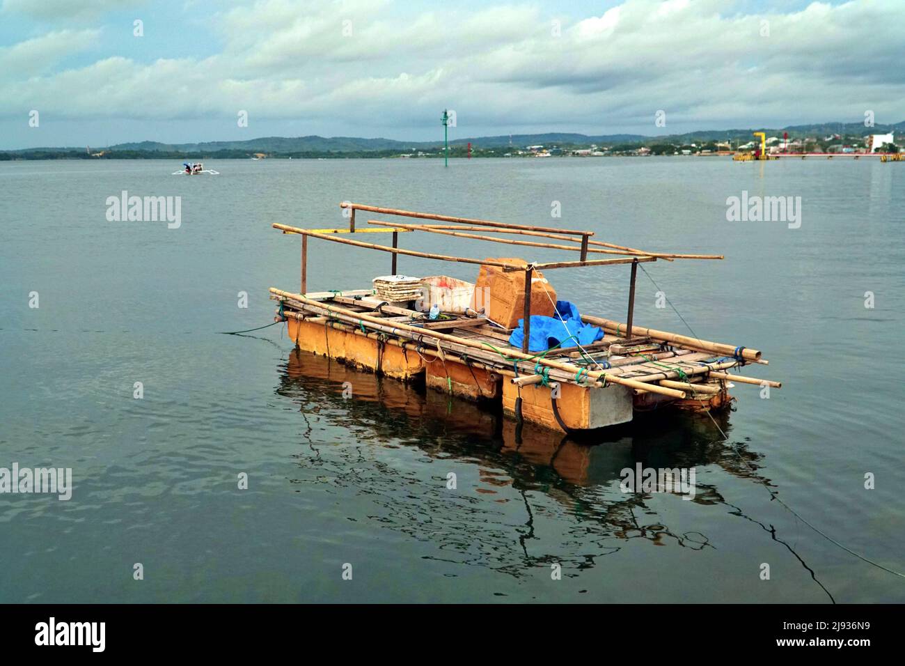 LITTLE BOAT ON THE SEA Stock Photo - Alamy