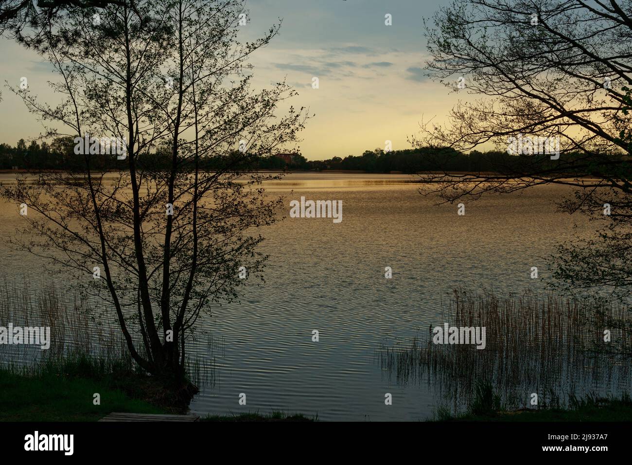 Sunset on the lake. Olow Lake in Masuria in the evening. Moody ...