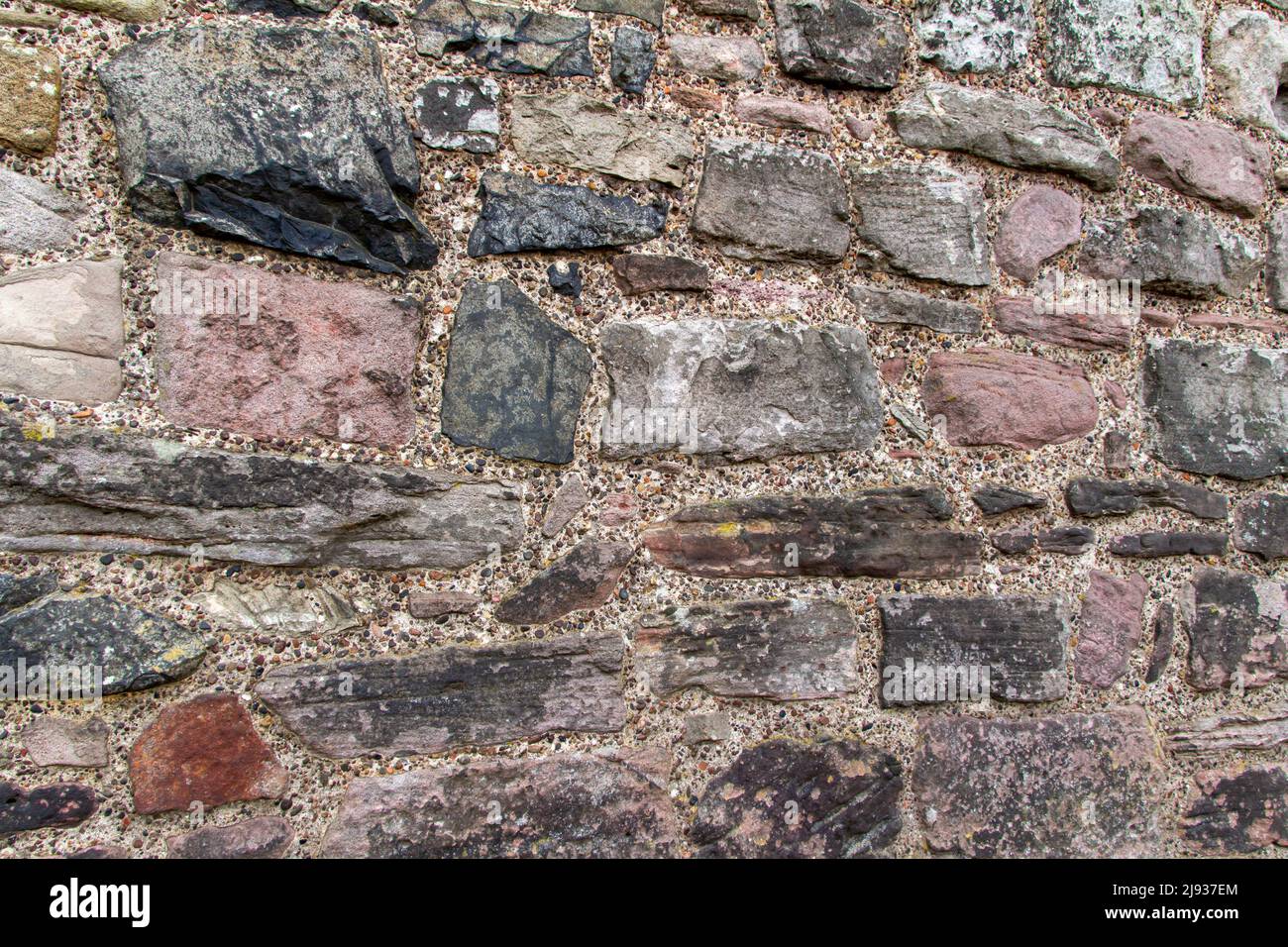 Beautiful old medieval European stone wall texture background, with ...