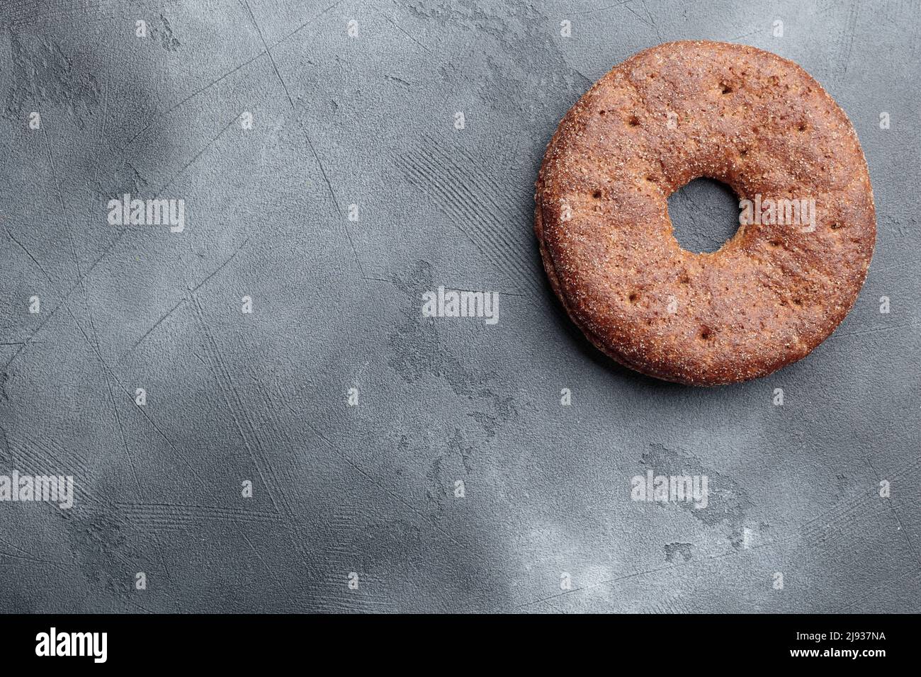 Reikaleipa - traditional finnish rye bread on a gray concrete ...