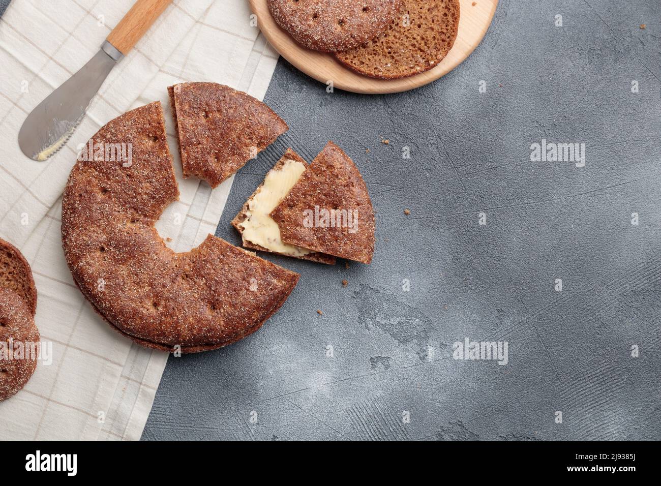 Reikaleipa - traditional finnish rye bread on a gray concrete ...