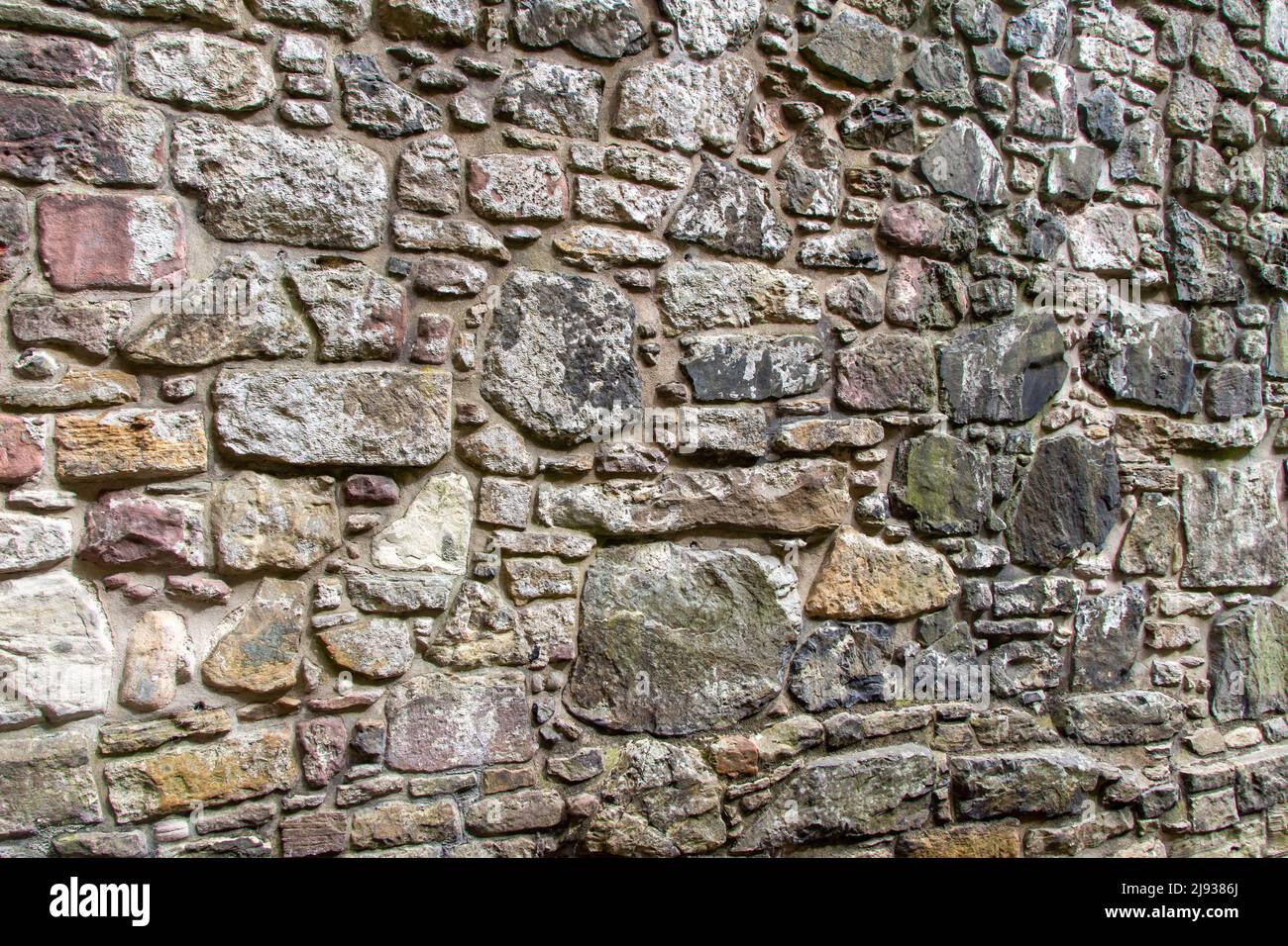 Beautiful old medieval European stone wall texture background, with ...
