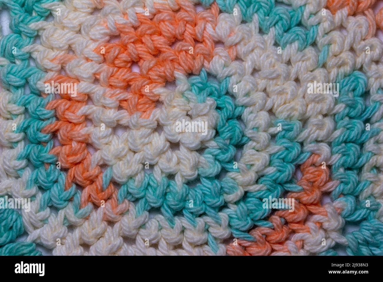 Close up abstract texture background of elegant crocheted fabric with ...