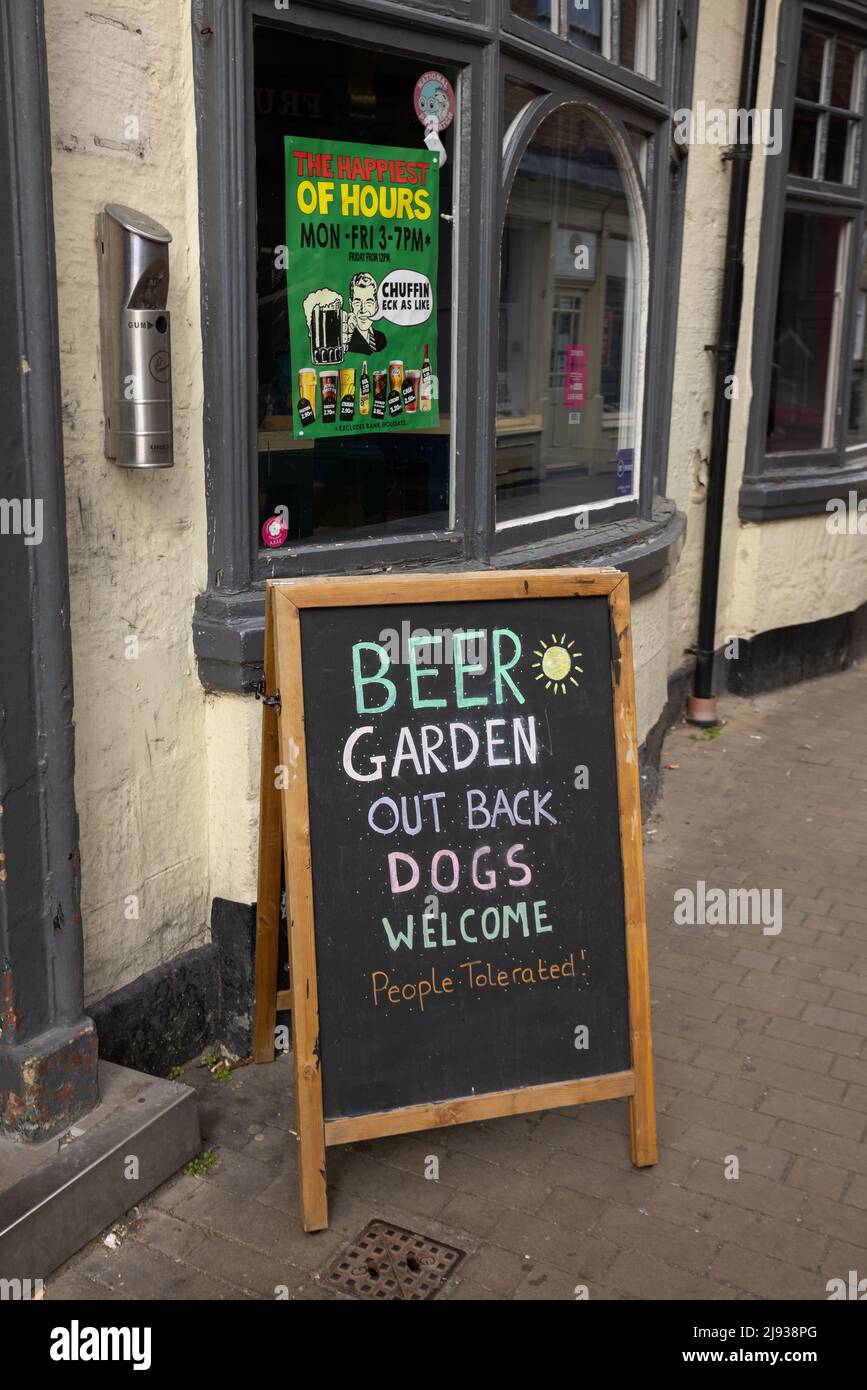 Pub sign in Knaresborough, Yorkshire saying Beer garden out back. Dogs ...