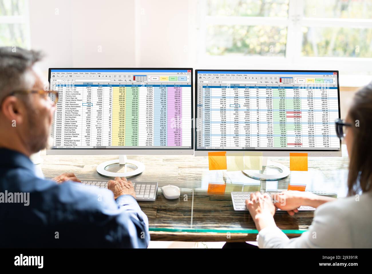 Analyst Employee Working On Spreadsheet Using Desktop Computer Stock ...