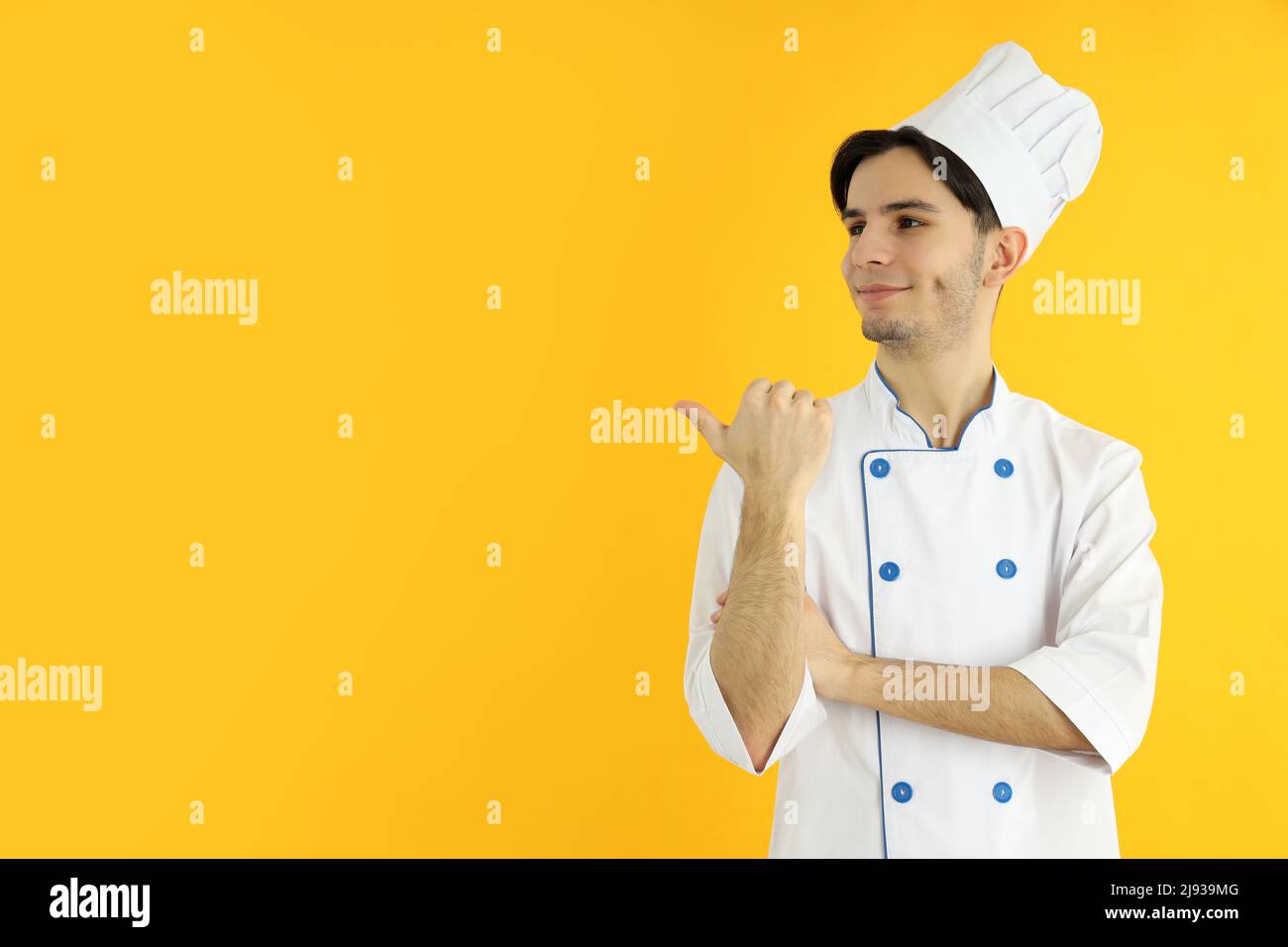 Handsome cooking chef showing hi-res stock photography and images - Alamy