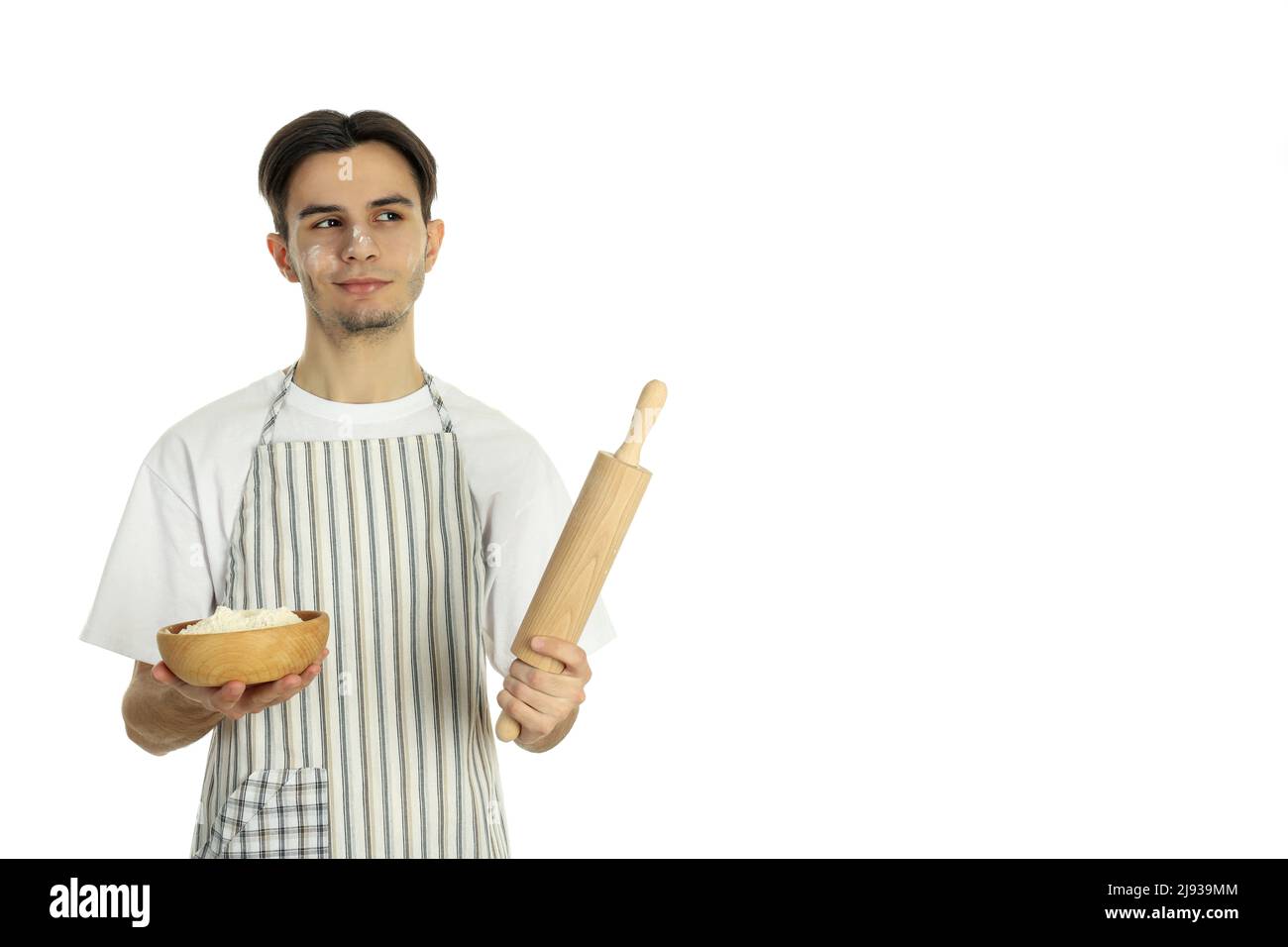 Concept of cooking, young man chef isolated on white background Stock ...