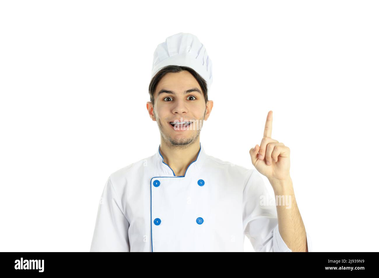 Concept of cooking, young man chef isolated on white background Stock ...