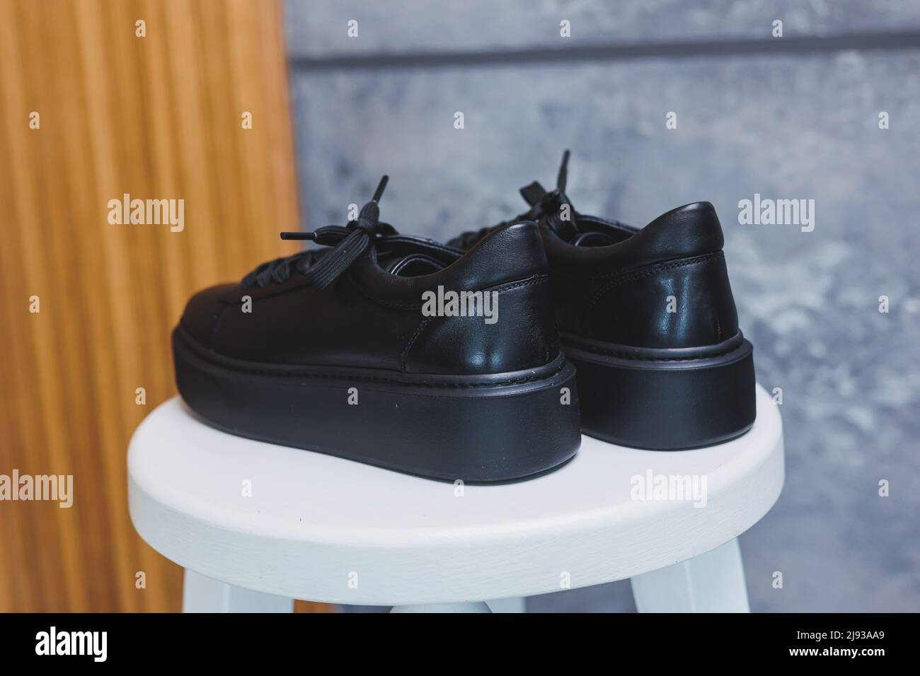 Black leather classic sneakers with laces. Casual women's style. Black ...