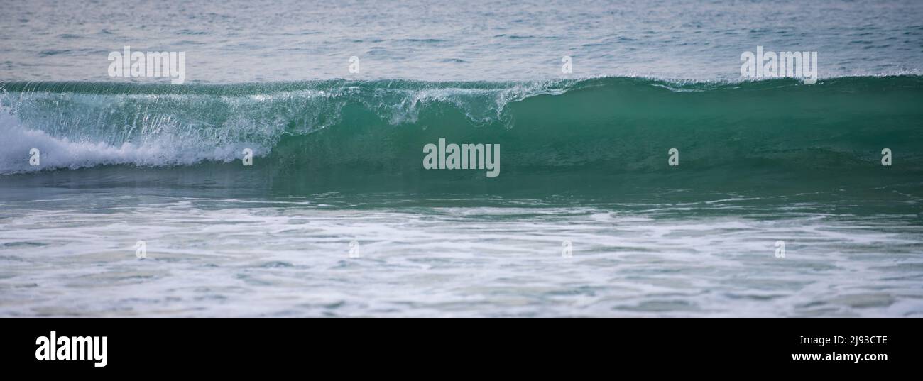 Summer beach, ocean waves on a tropical sea with deep blue wawes. Calm ...