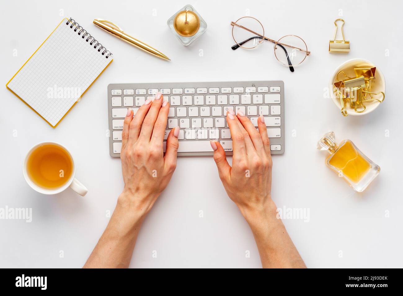 Hands on work place office desk. Home office table with supplies and ...