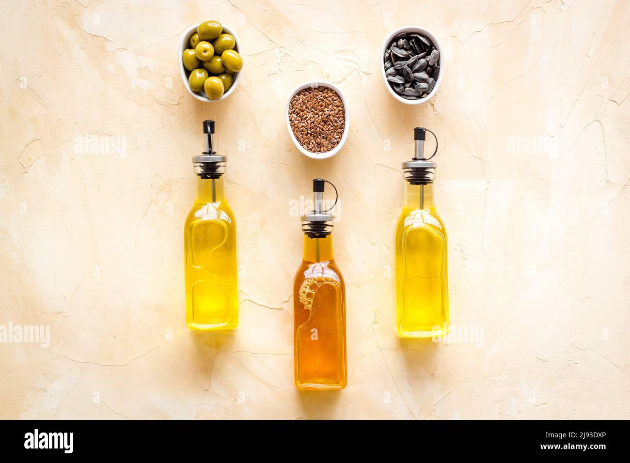 Different kind of cooking oil - sunflower olive and sesame oil with ...