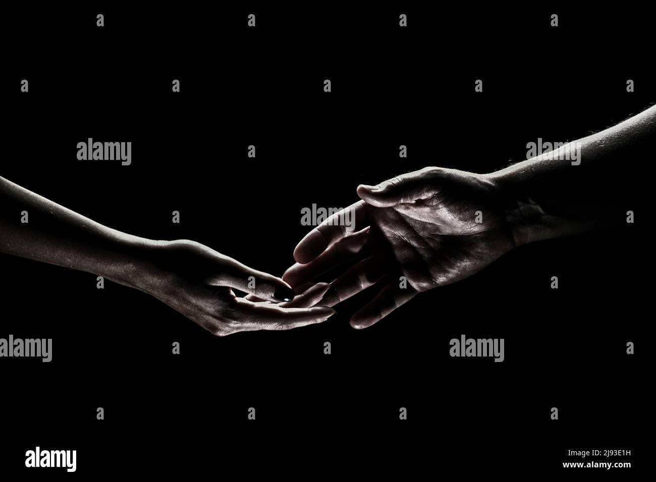 Two hands reaching toward. Helping hand outstretched for salvation on ...