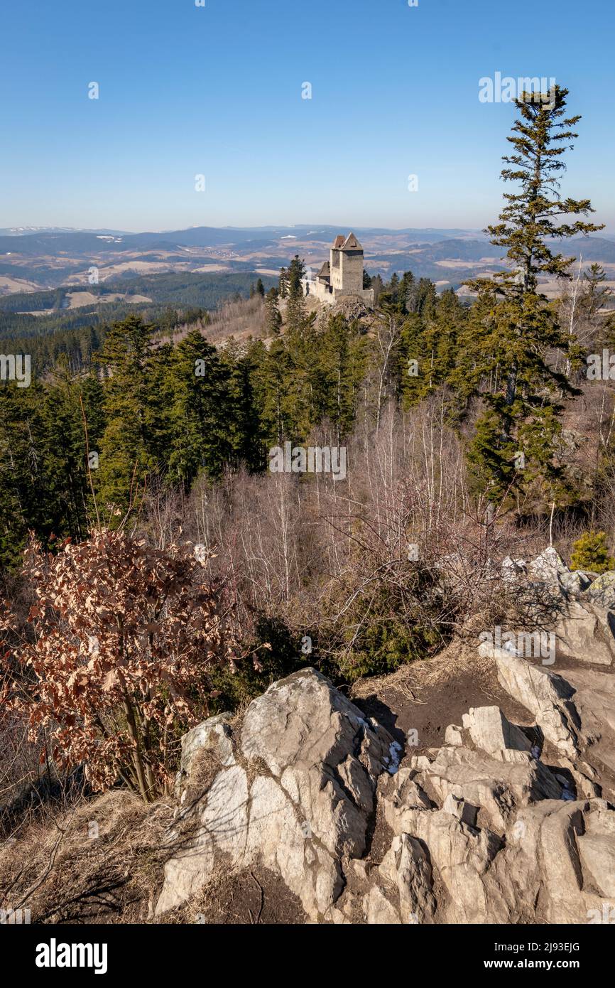 The Gothic castle Kasperk rises on a rocky peak. It is the highest ...